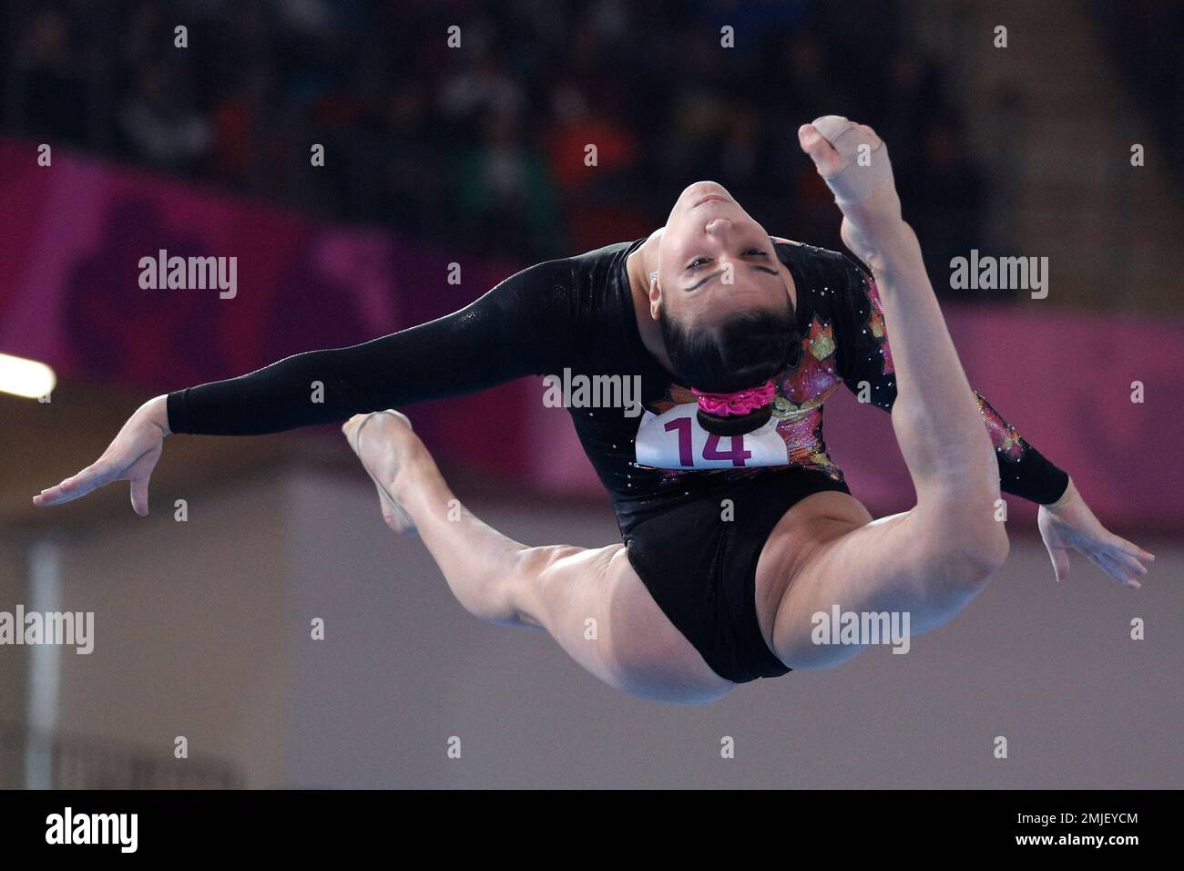 Brooklyn Moors of Canada competes on the floor exercise to win the gold ...