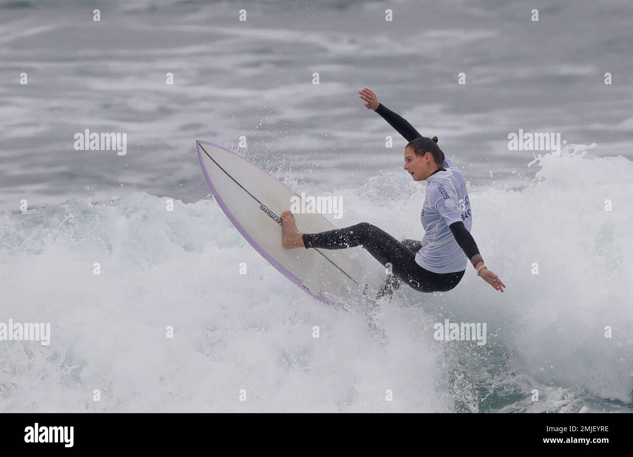 Barbados Chelsea Tuach competes in the women's open surfing repechage ...