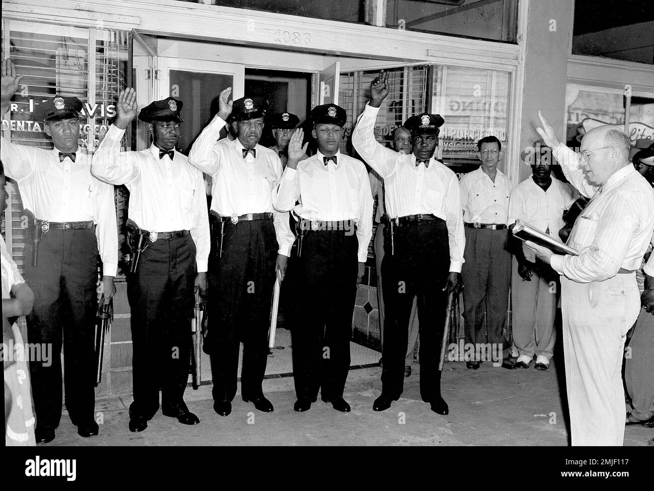 Five black policemen, the first in Miami, Fla., are sworn in by safety ...