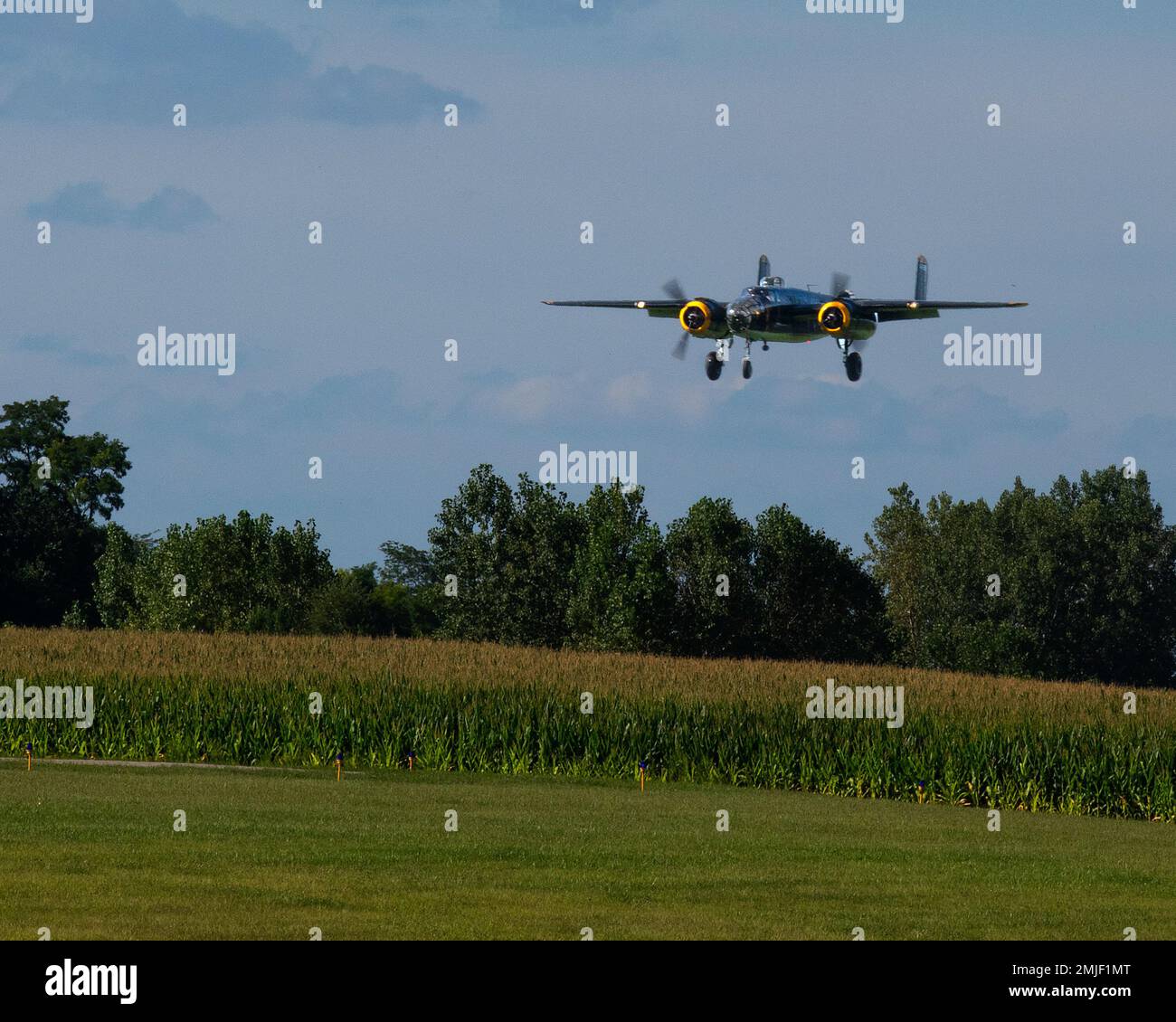 The Champaign Gal makes an approach over a rural Ohio cornfield as it ...