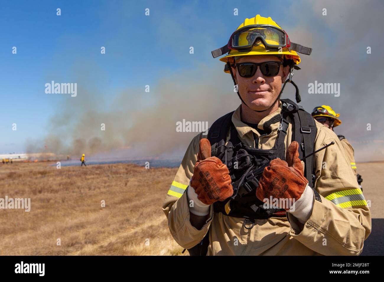 A firefighter from San Diego Fire Rescue poses in front of the ...