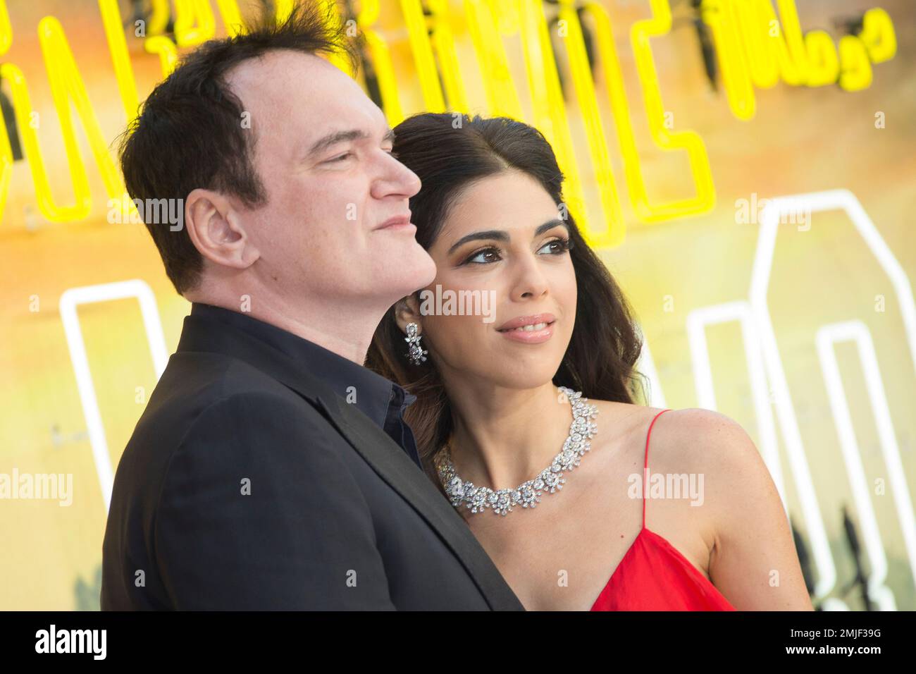 Writer and director Quentin Tarantino and his wife Daniela Pick pose ...