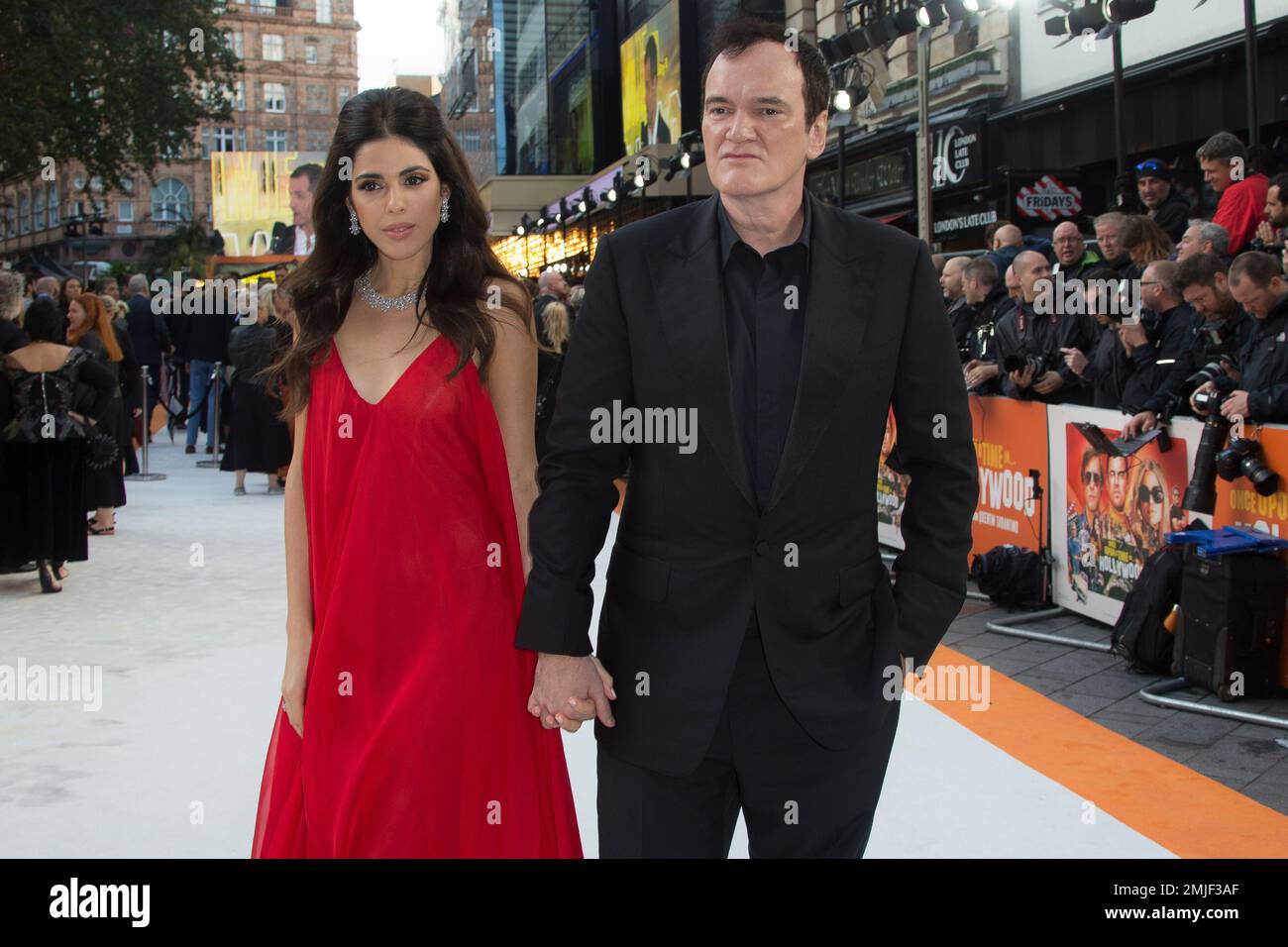 Writer and director Quentin Tarantino and his wife Daniela Pick pose ...