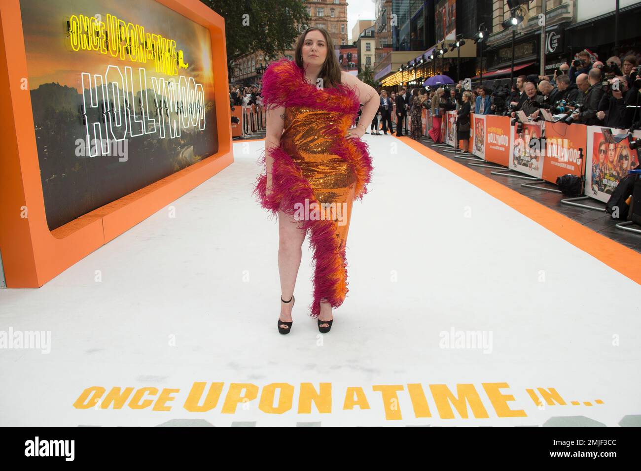 Actress Lena Dunham poses for photographers upon arrival at the UK ...