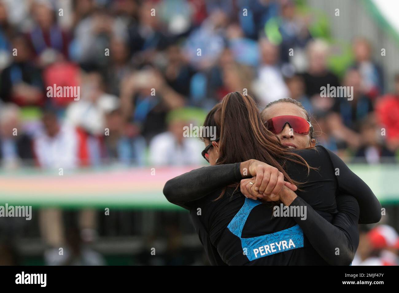 Argentina's Ana Gallay embraces teammate Fernanda Pereyra after losing ...