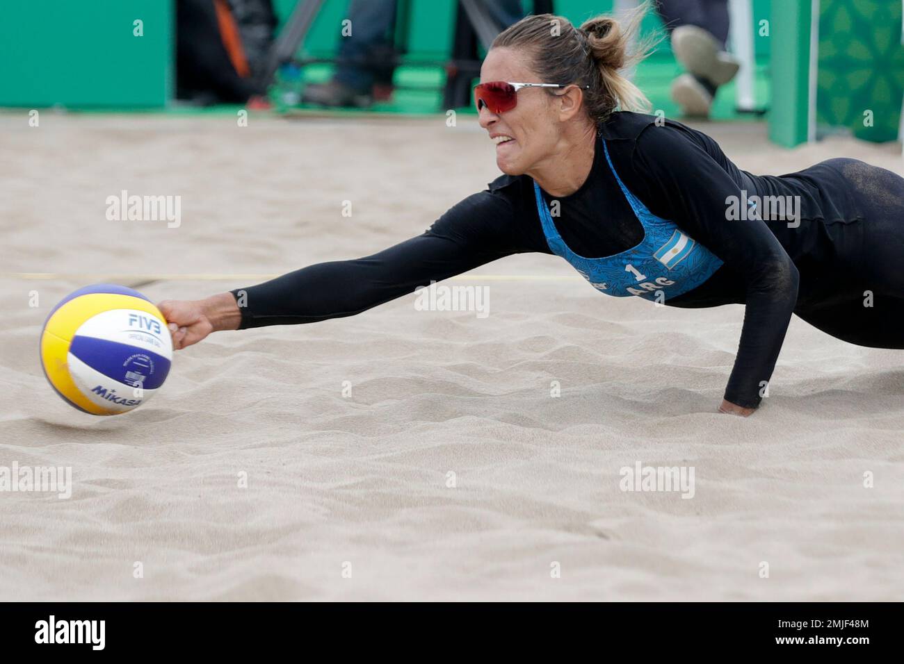 Ana Gallay or Argentina dives for the ball during the women's beach ...