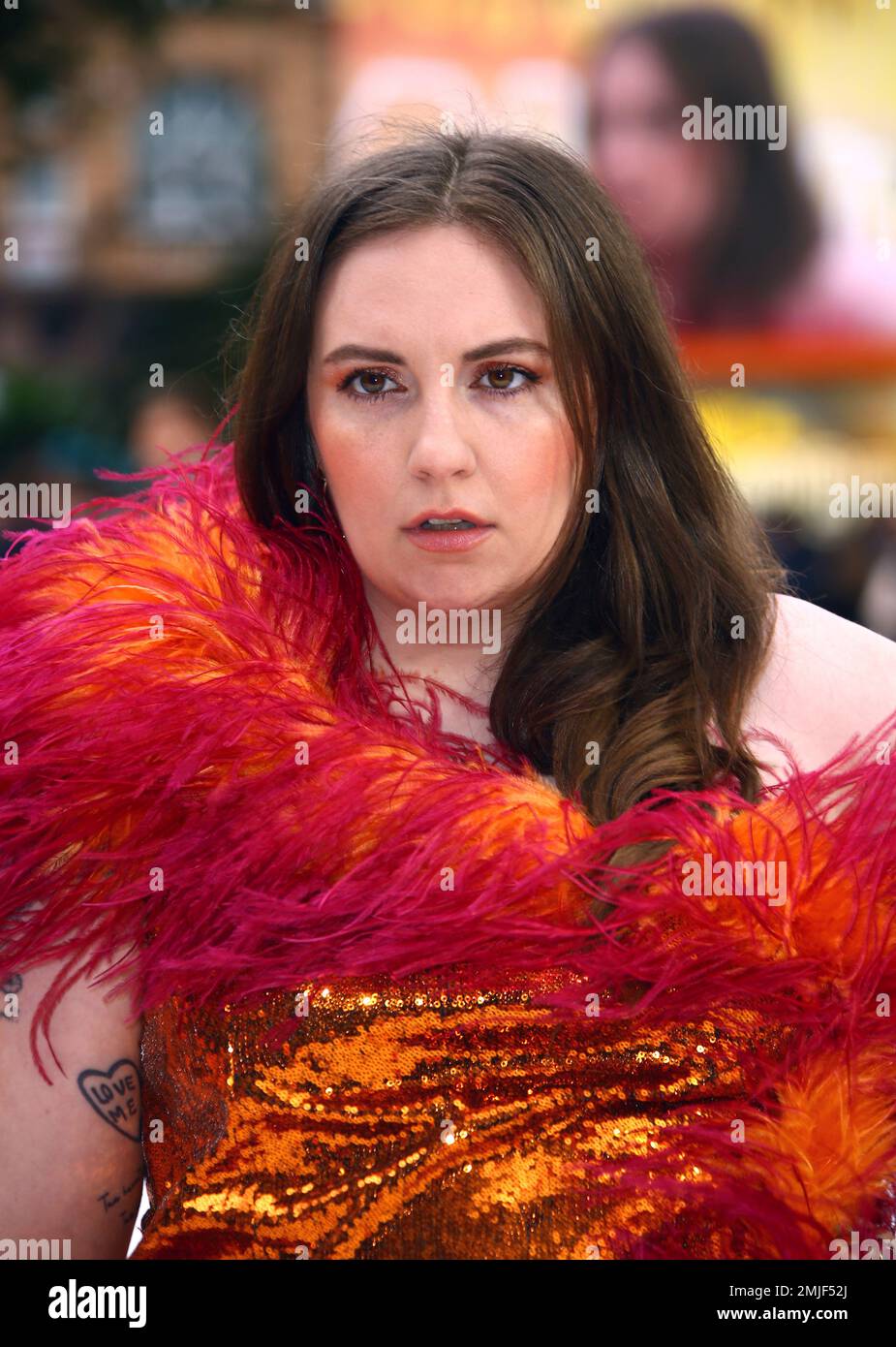 Actor Lena Dunham poses for photographers upon arrival at the UK ...