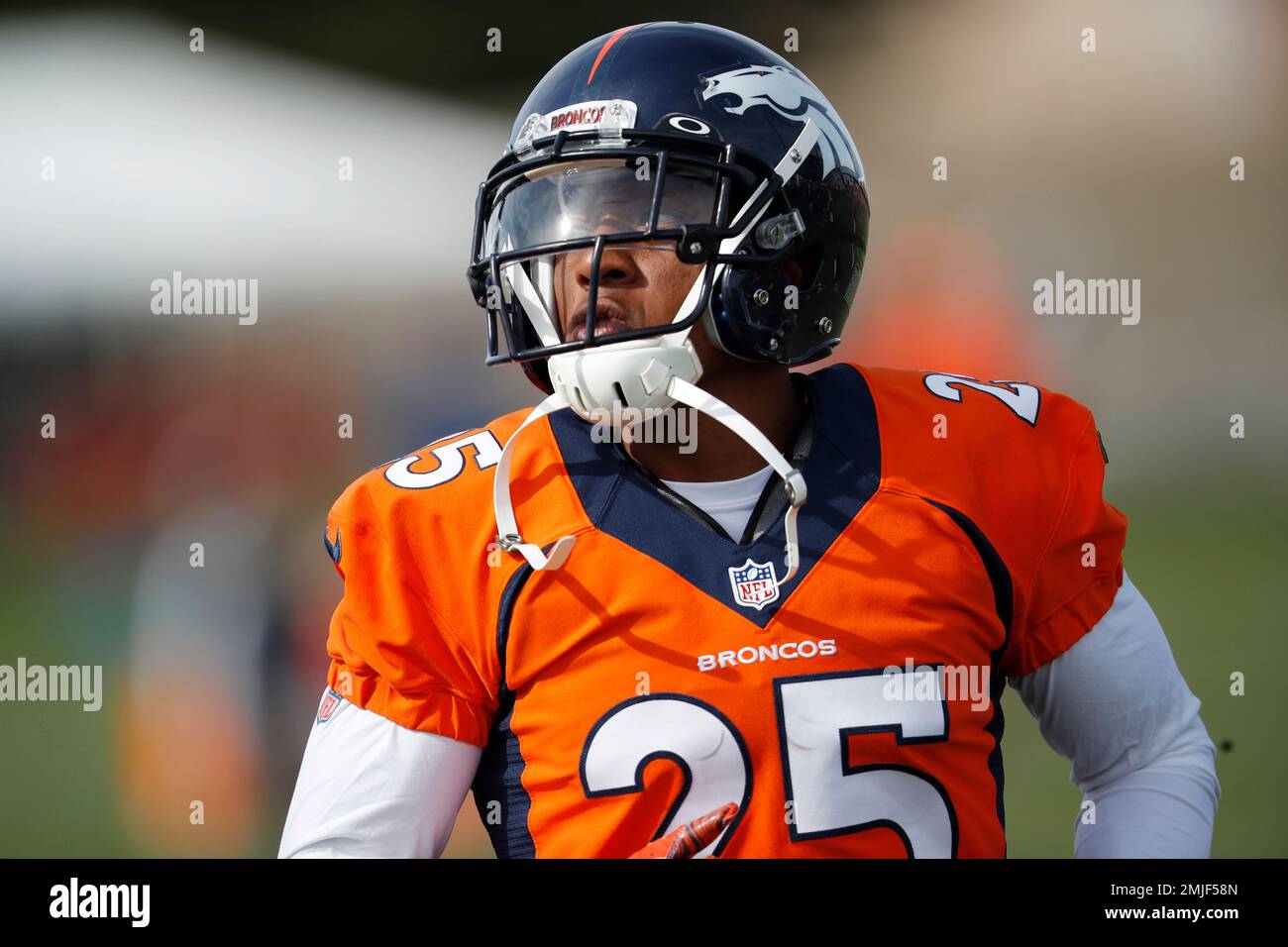 Denver Broncos cornerback Chris Harris warms up during an NFL football ...