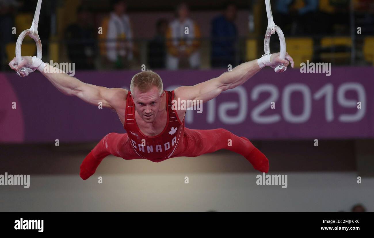 Cory Paterson of Canada competes on the rings to win the bronze medal ...