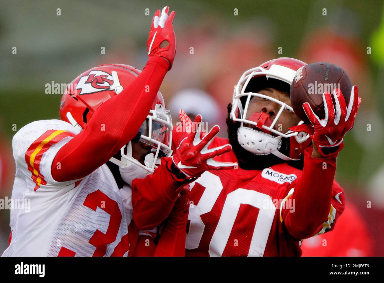 Kansas City Chiefs wide receiver Felton Davis, right, catches a ball ...