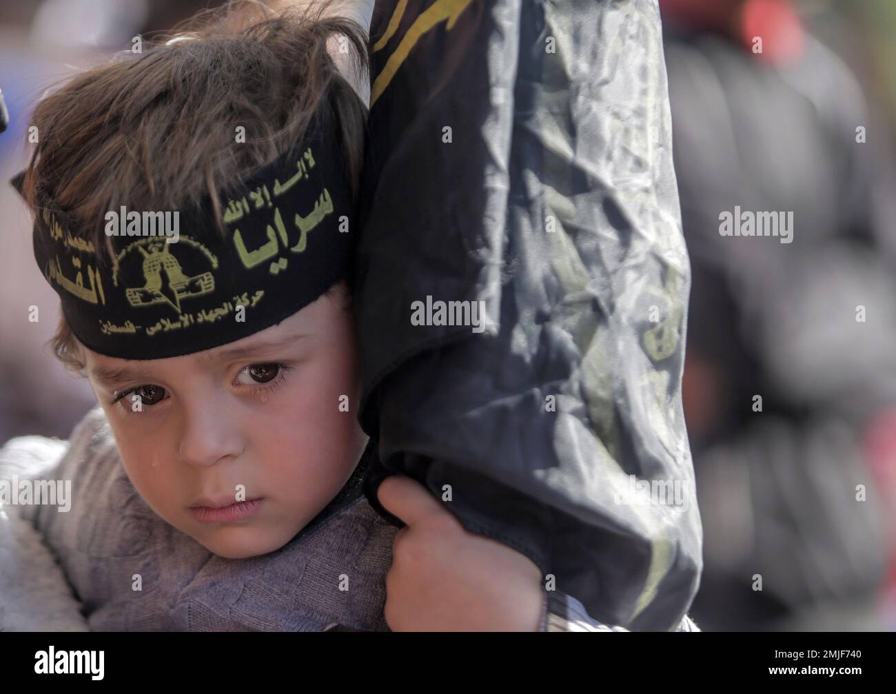 A young Palestinian supporter of the Islamic Jihad movement attends ...