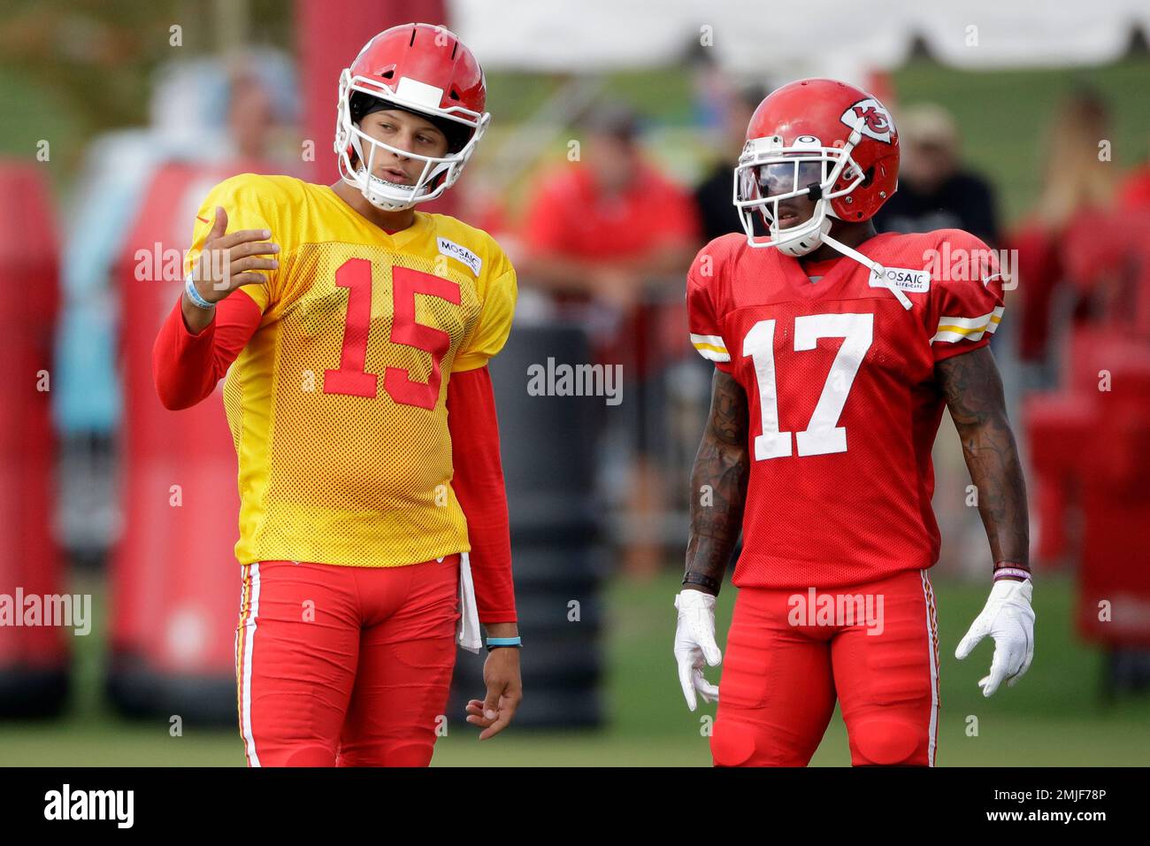 Kansas City Chiefs quarterback Patrick Mahomes (15) talks to wide ...