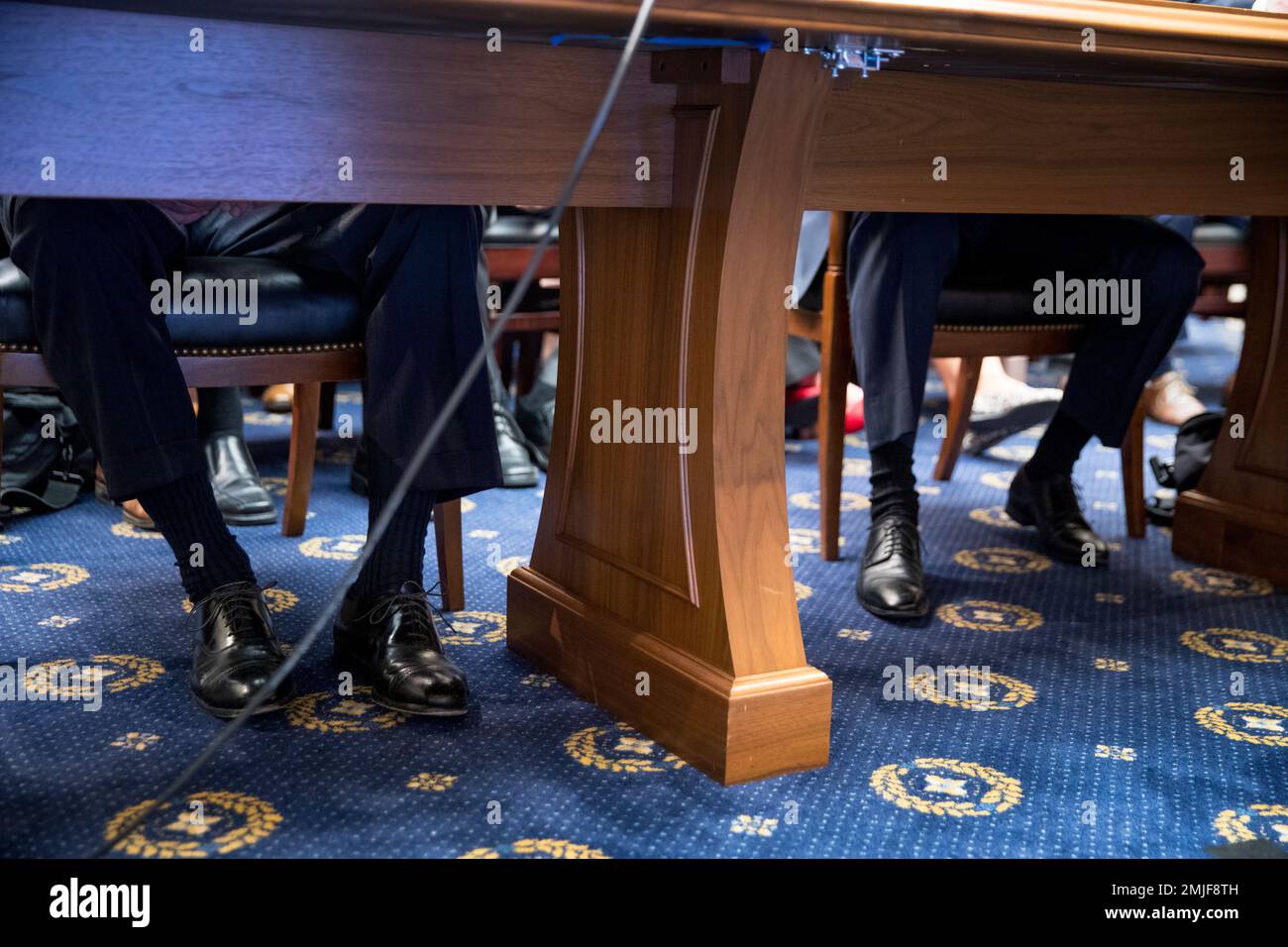 Former special counsel Robert Mueller, left, accompanied by his top ...