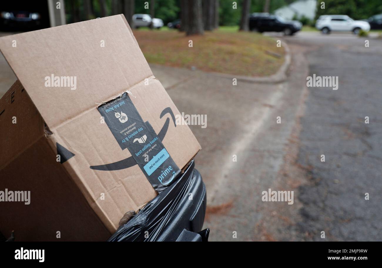 A empty Amazon box sits outside a north Jackson, Miss., residence ...