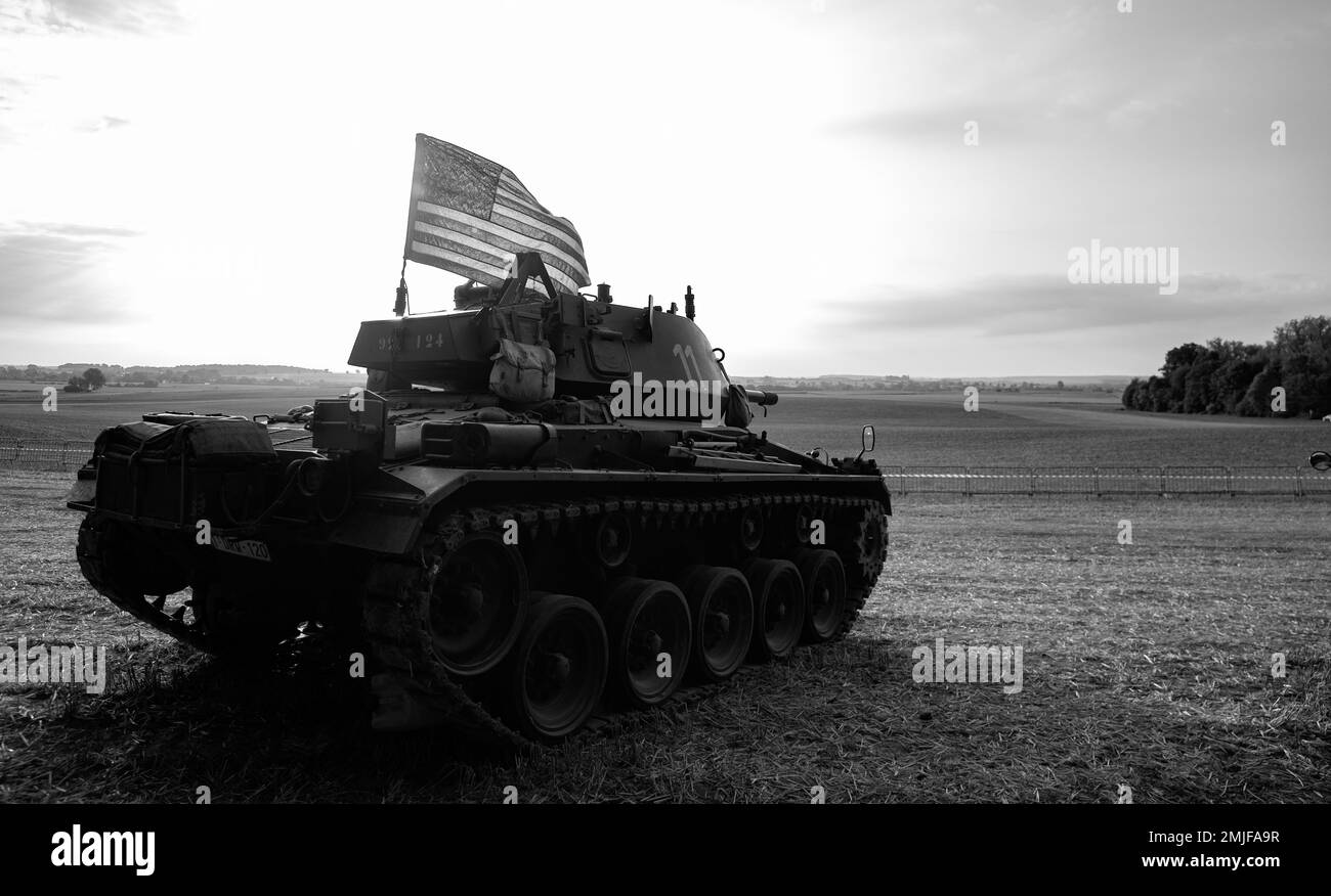 An M24 Chaffee light tank stands in the glow of the morning light at ...