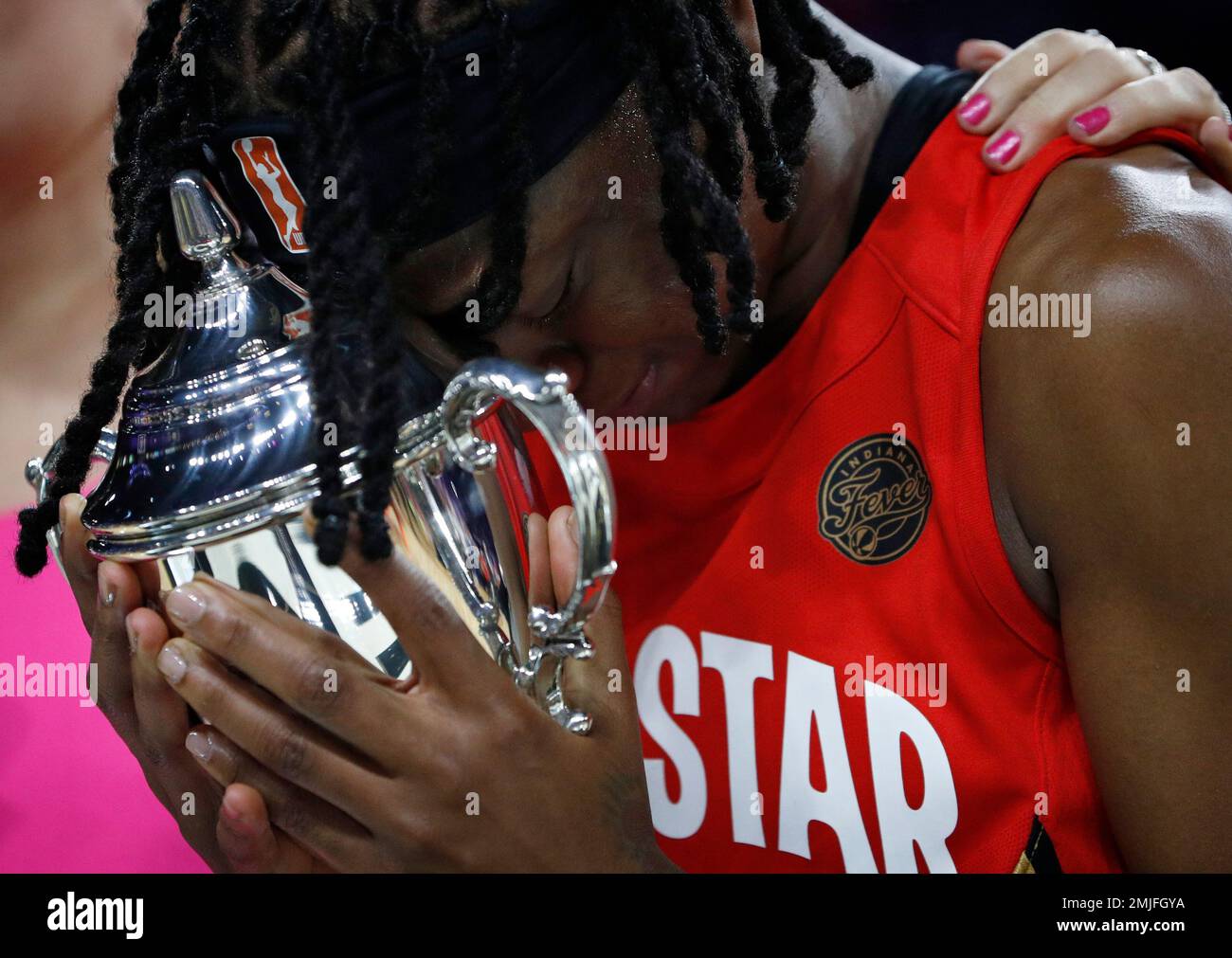 Indiana Fever's Erica Wheeler, of Team Wilson, cries as she holds the ...