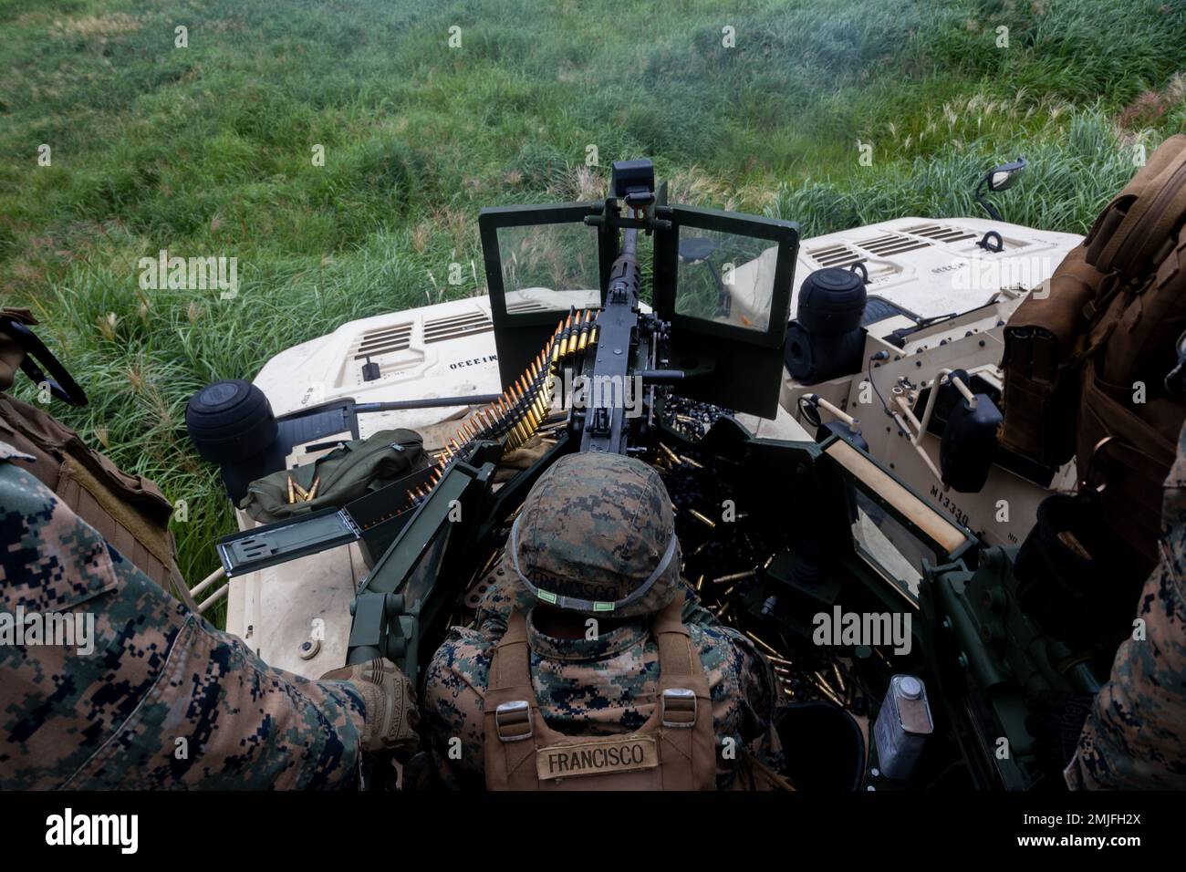 U.S. Marine Corps Lance Cpl. Brandon Francisco, a field artillery ...