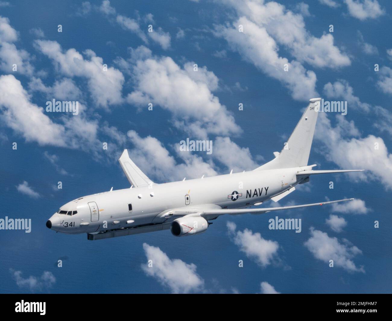 A U.S. Navy P-8 Poseidon, with the Naval Air Station Jacksonville, Florida, flies away from the ...