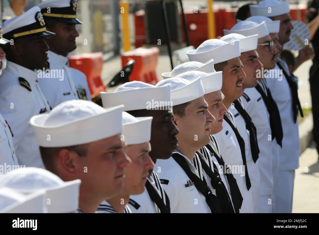 Sailors stand during a commissioning ceremony for the U.S. Navy's ...