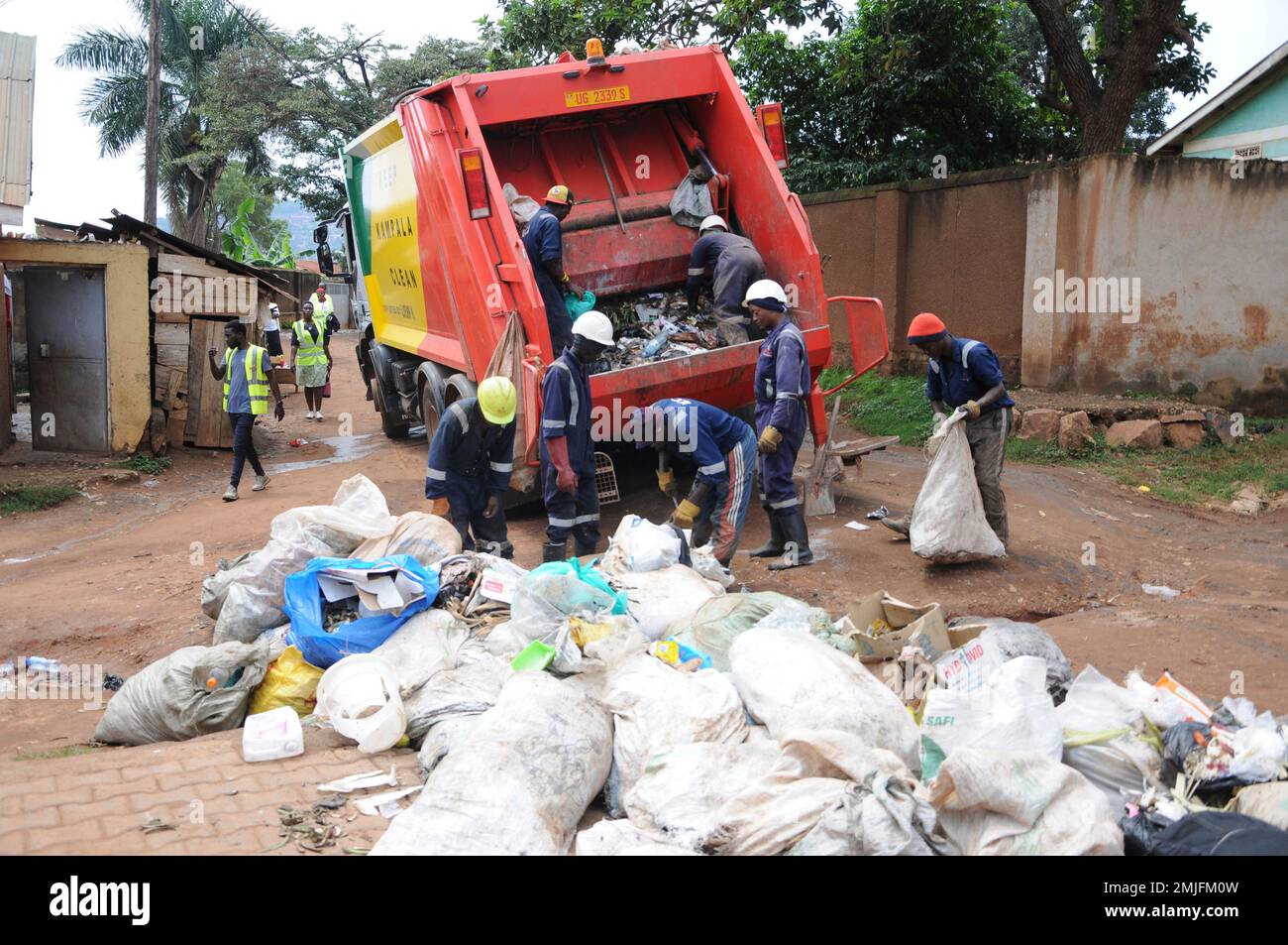 In this photo of Wednesday, July 10, 2019, workers of Kampala Capital ...