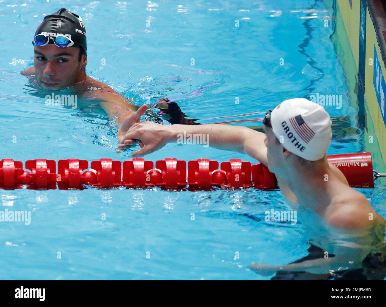 Italy's Gregorio Paltrinieri , left, and United States' Zane Grothe ...