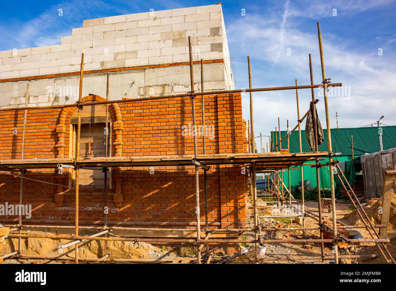 Construction of an old-style building with arched windows Stock Photo ...