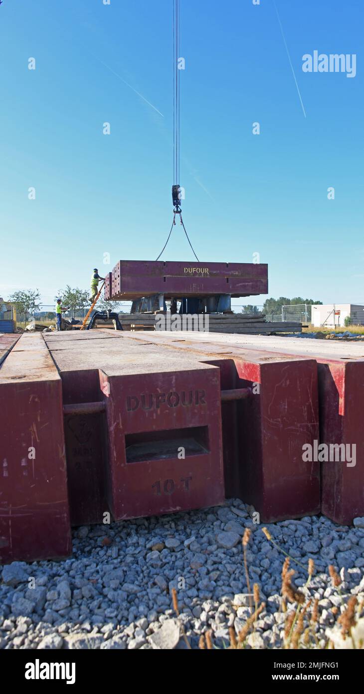10-ton weights lay in front of the load test, where 28 weights, and a ...
