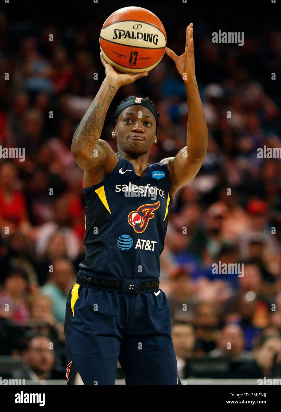 Indiana Fever's Erica Wheeler shoots at the 3-point contest during the ...
