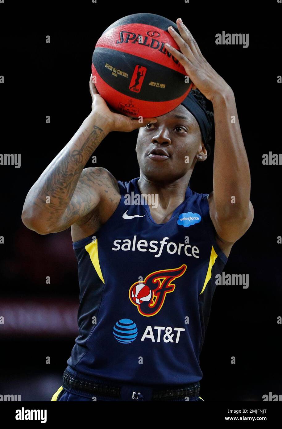 Indiana Fever's Erica Wheeler shoots at the 3-point contest during the ...