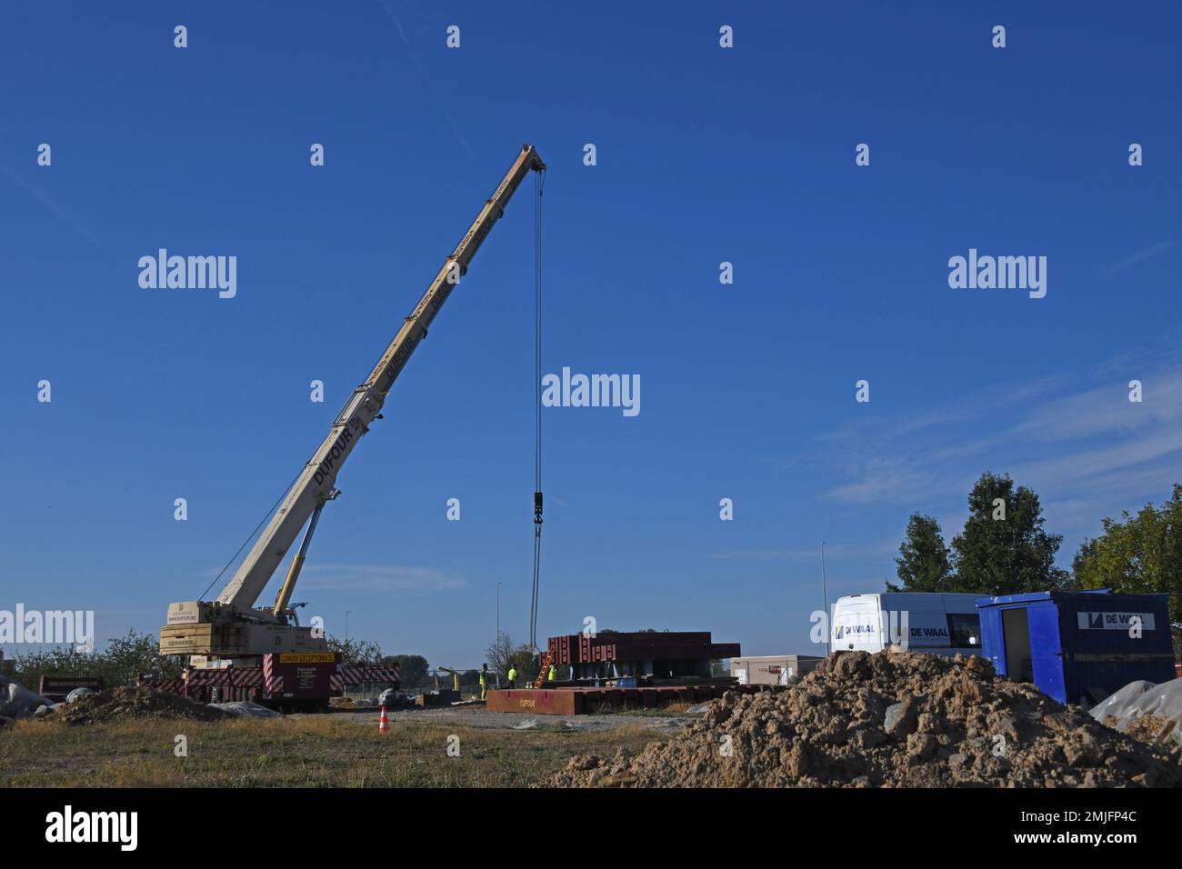 View of the construction site, with the controlled load structure, as ...
