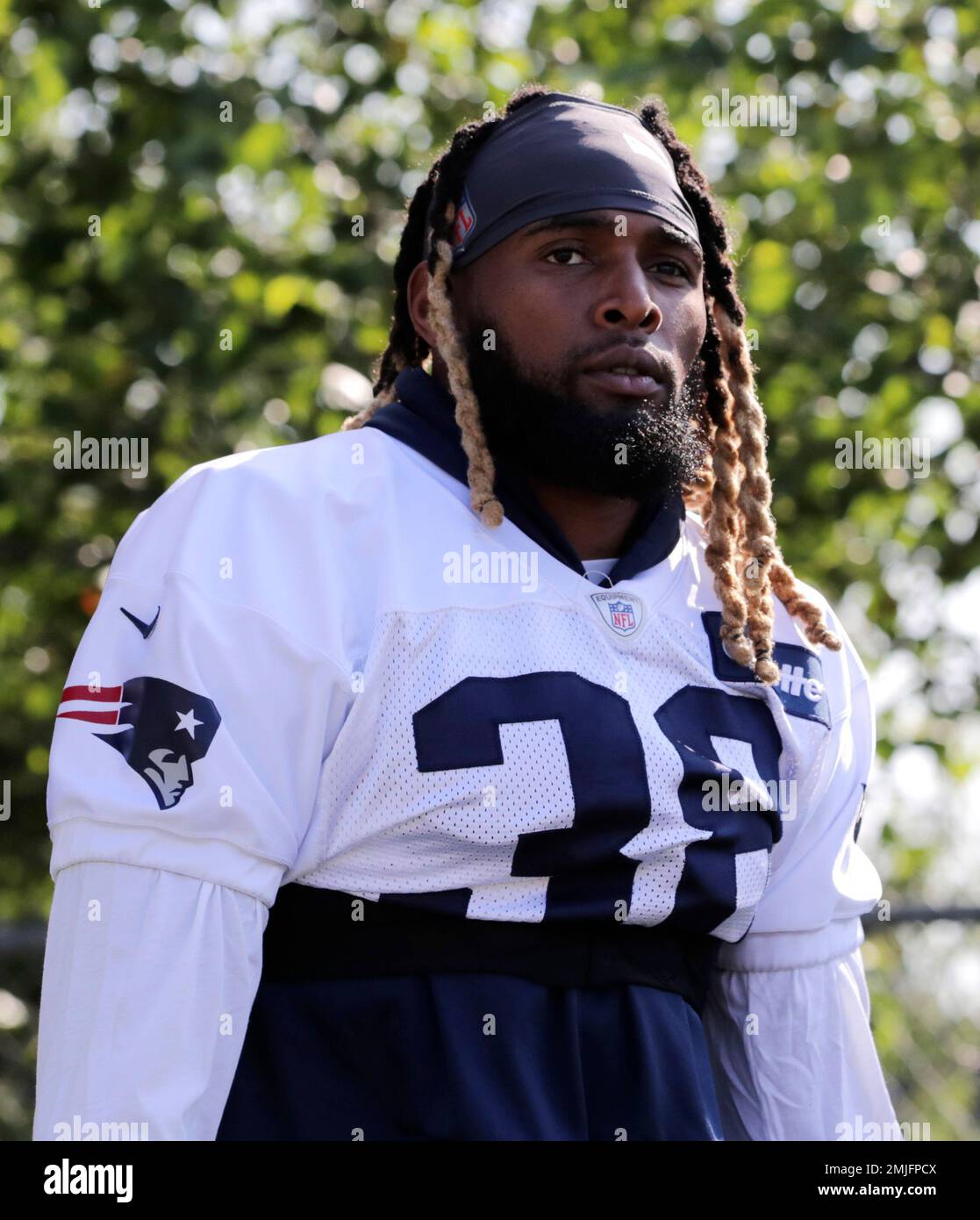 New England Patriots running back Brandon Bolden heads to the field ...