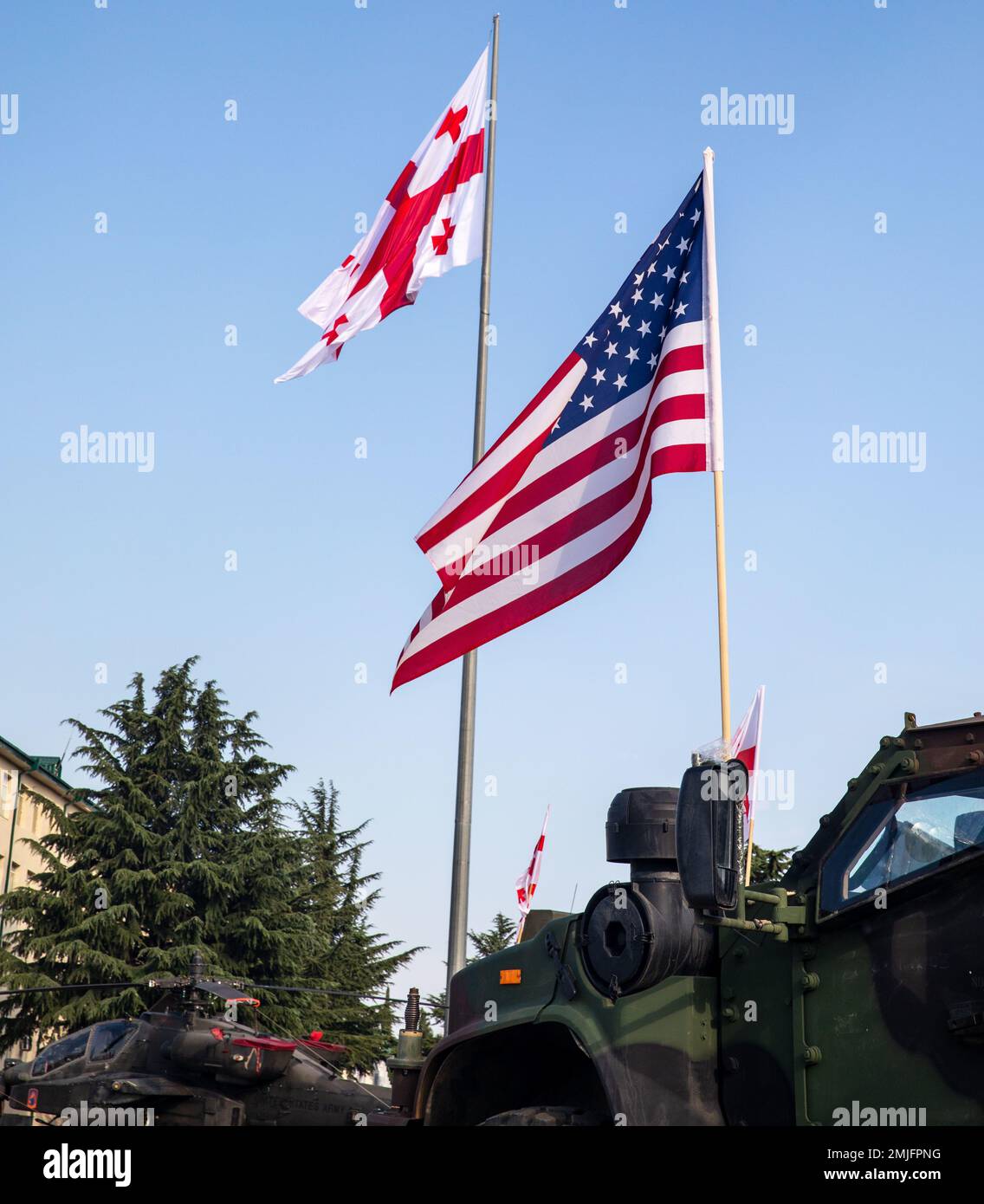 The U.S. and Georgian flags wave on display for the opening ceremony of ...