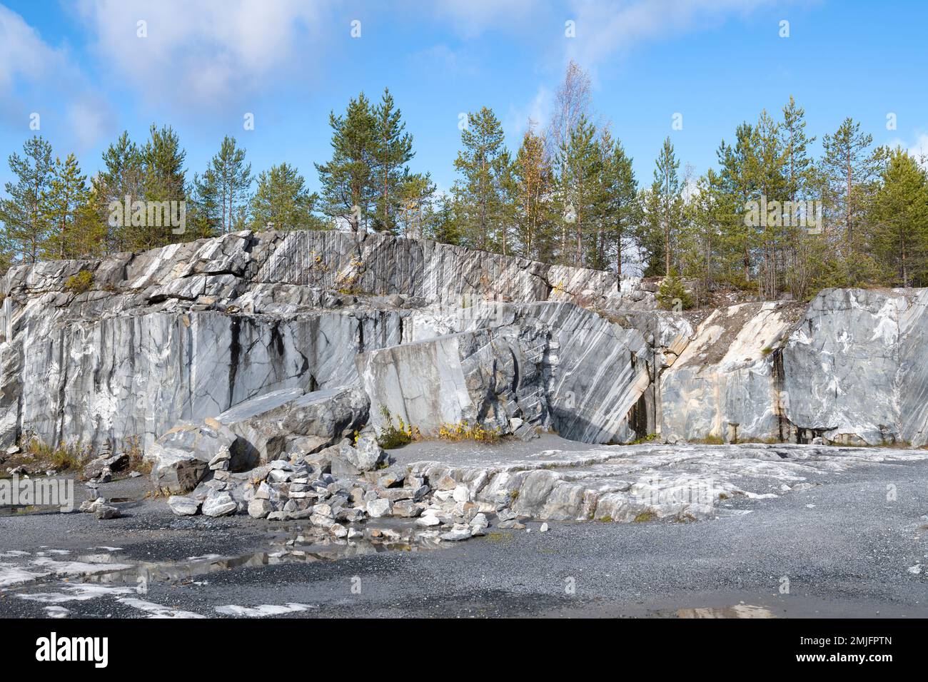 Sunny October day in an old marble quarry (Italian Quarry). Mountain ...