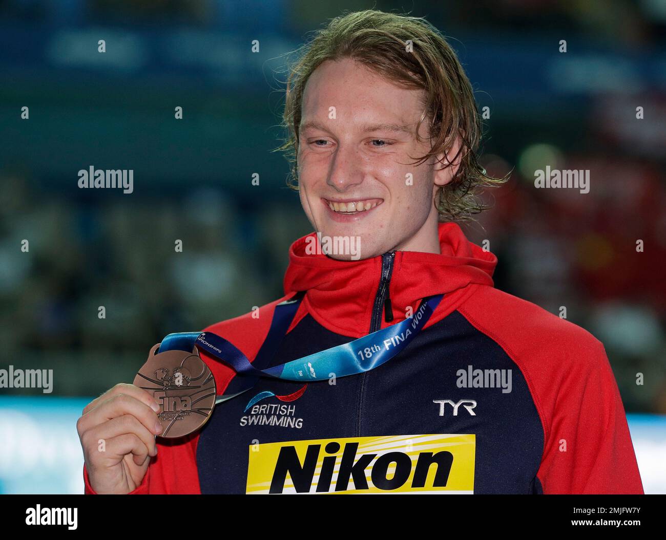 Bronze medalist Britain's Luke Greenbank holds up his medal following ...