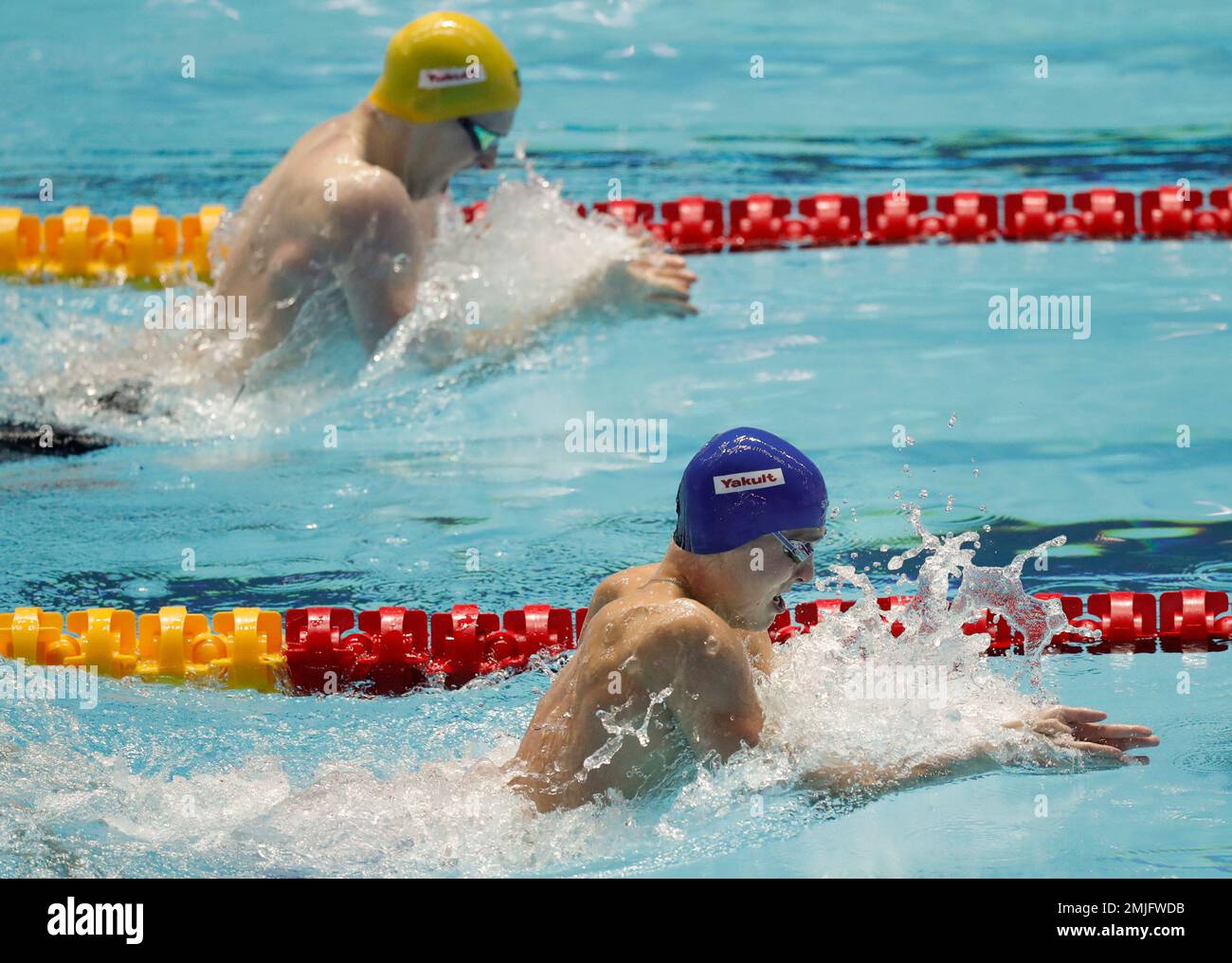 Russia's Anton Chupkov, bottom, leads Australia's Matthew Wilson to win ...