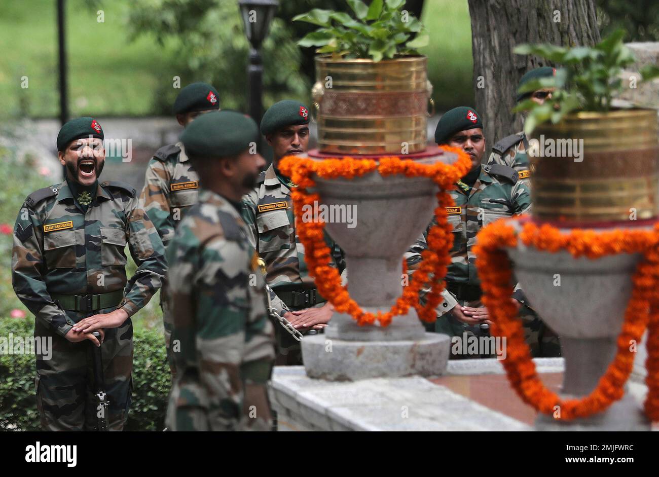 An Indian army soldier gives a command during Kargil Vijay Diwas, or ...