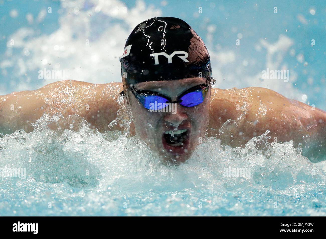 United States' Jack Conger swims in his heat of the men's 100m ...