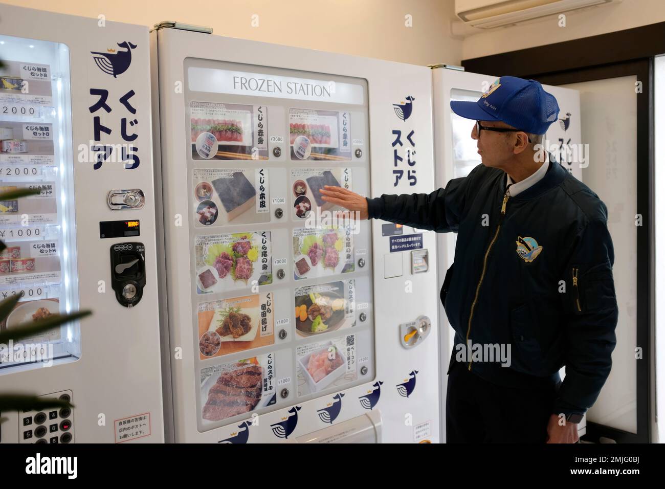 Konomu Kubo, a spokesperson for Kyodo Senpaku Co. explains how whale meat is being sold from a ...