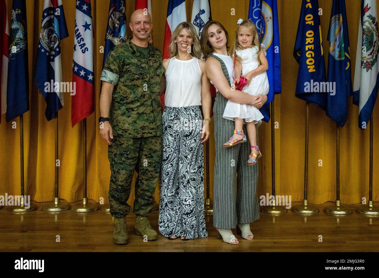 U.S. Marine Corps Sgt. Maj. Anthony J. Easton, and his family pose for ...