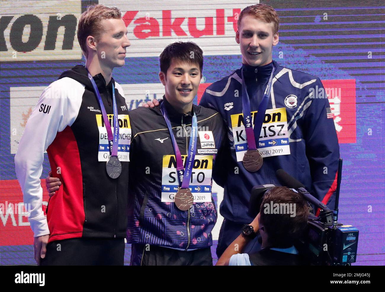 Gold medalist Japan's Daiya Seto, centre, stands with silver medalist ...