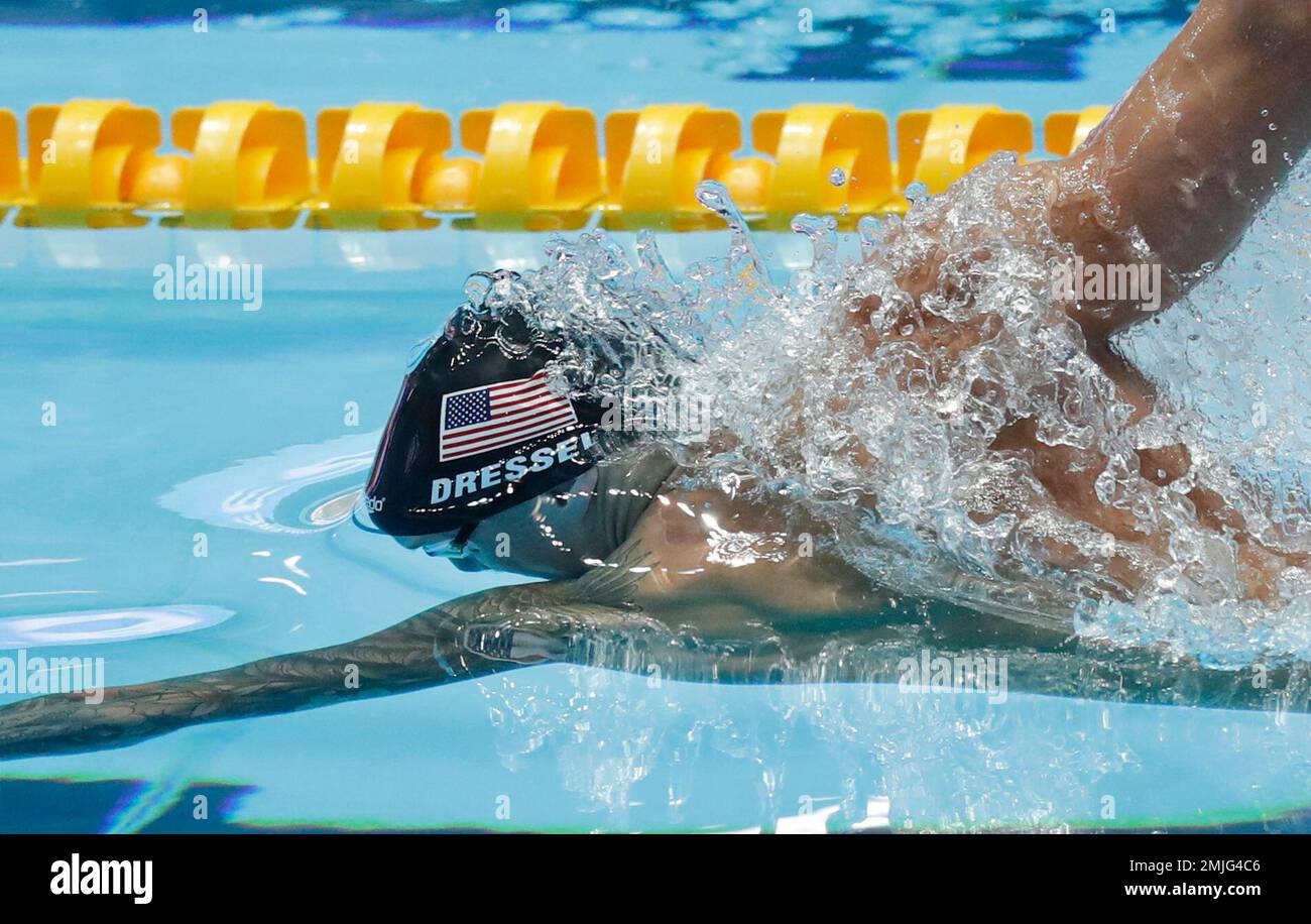 United States' Caeleb Dressel swims in the men's 100m freestyle final ...
