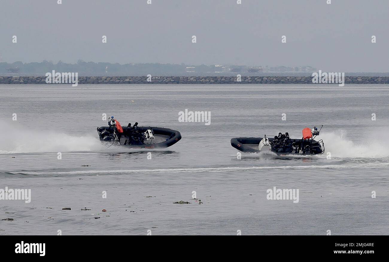 Philippine Coast Guards demonstrate their skills in responding to ...