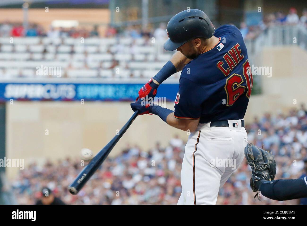 Minnesota Twins' Jake Cave hits a sacrifice fly off New York Yankees ...