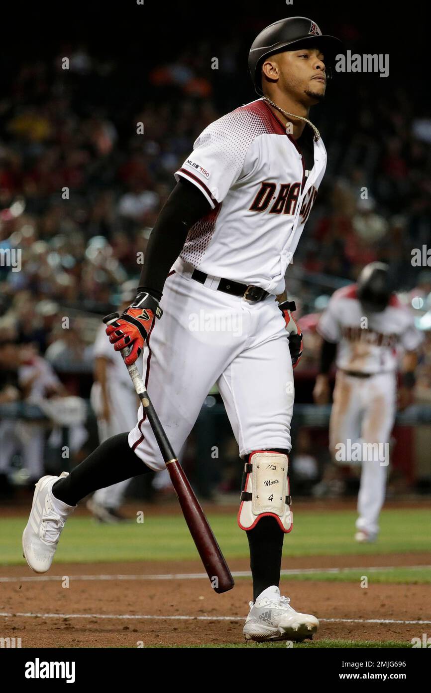 Arizona Diamondbacks' Ketel Marte walks with the bases loaded as ...