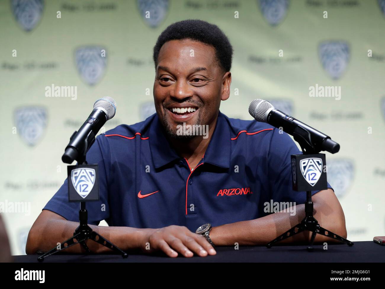 Arizona head coach Kevin Sumlin answers questions during the Pac-12 ...