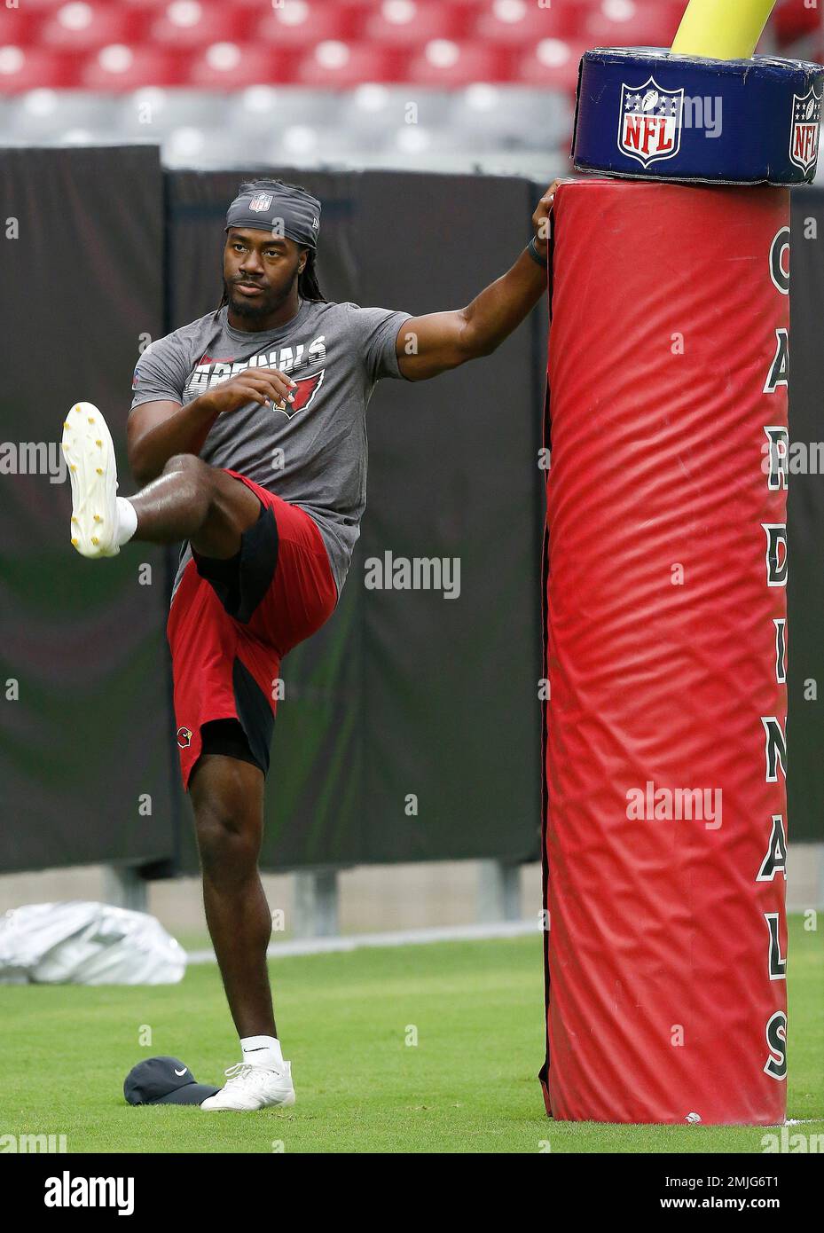 Arizona Cardinals cornerback Josh Shaw stretches out as the Cardinals ...