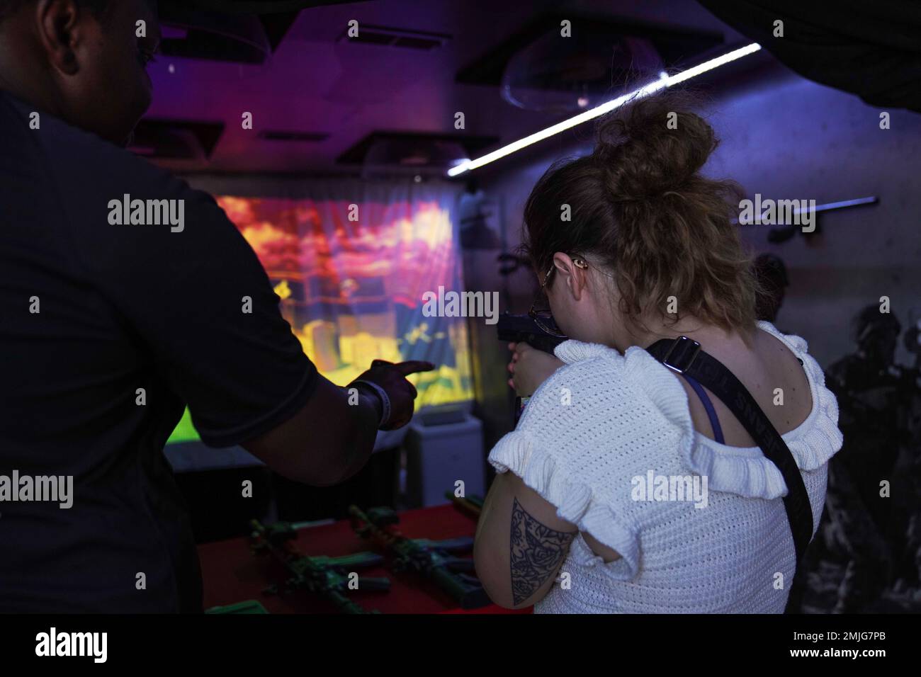 U.S. Marine Corps Staff Sgt. Raheem R. Edwards, left, an enhanced ...