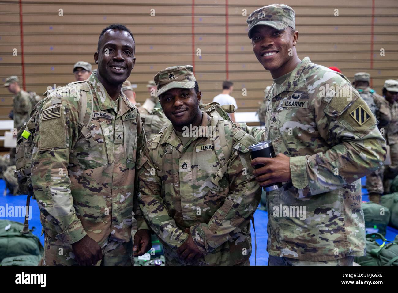 U.S. Army Pfc. Ralph Pierre, Staff Sgt. Brandon Mings and Sgt ...