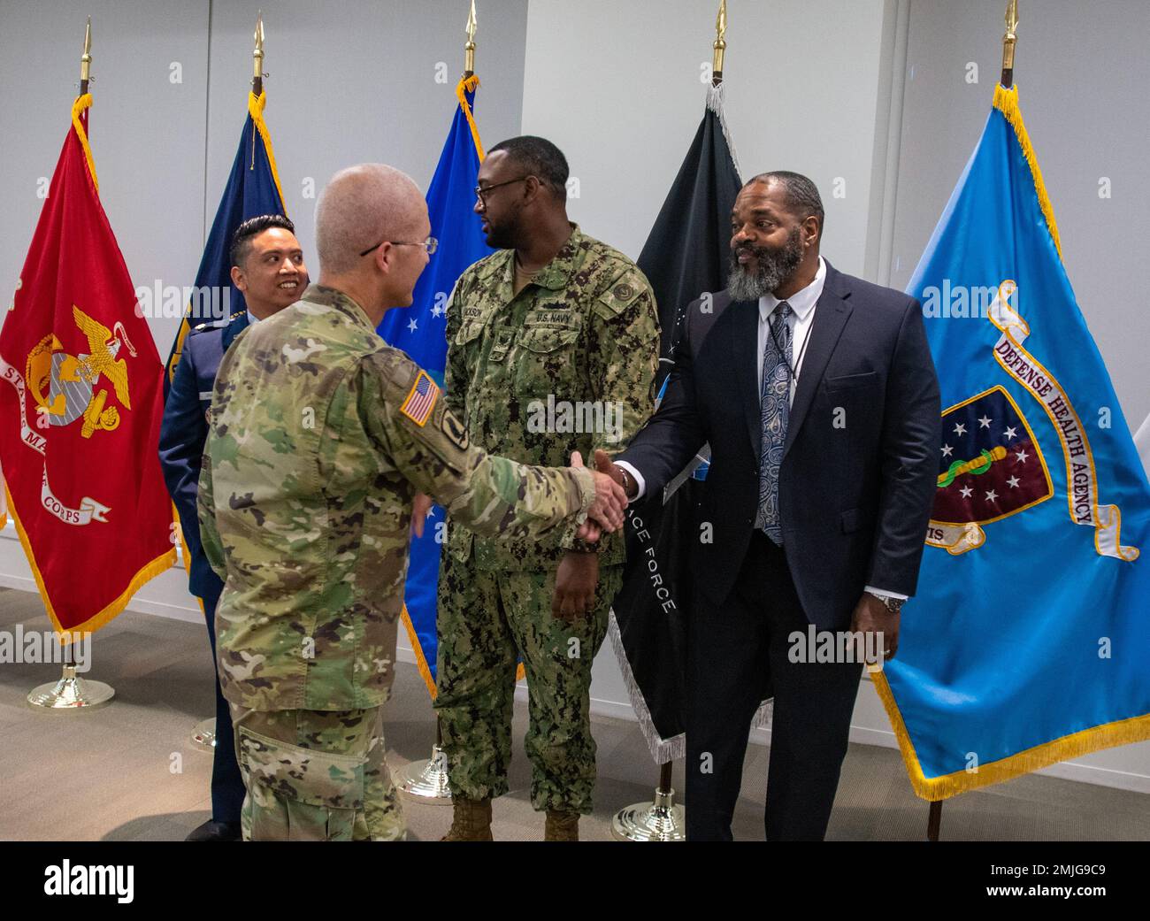 LTG Ronald J. Place, DHA Director, congratulates Chris Hudson after the ...