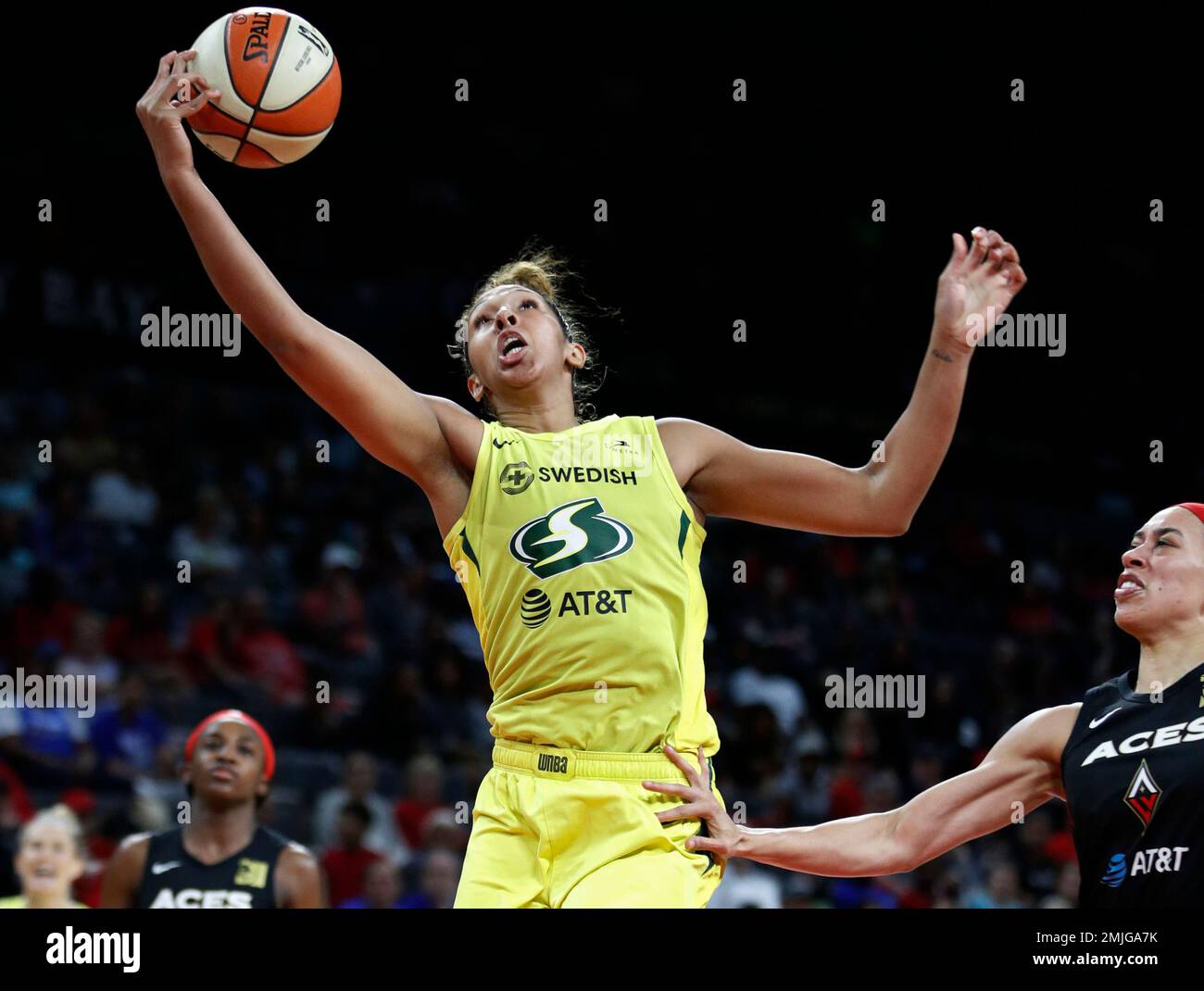 Seattle Storm's Mercedes Russell grabs a pass over Las Vegas Aces ...